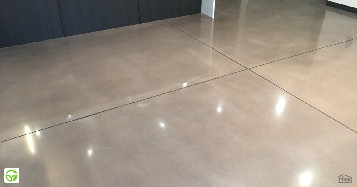 800 Grit cream polish with grey dye with Concrete Flooring by DeltaCrete