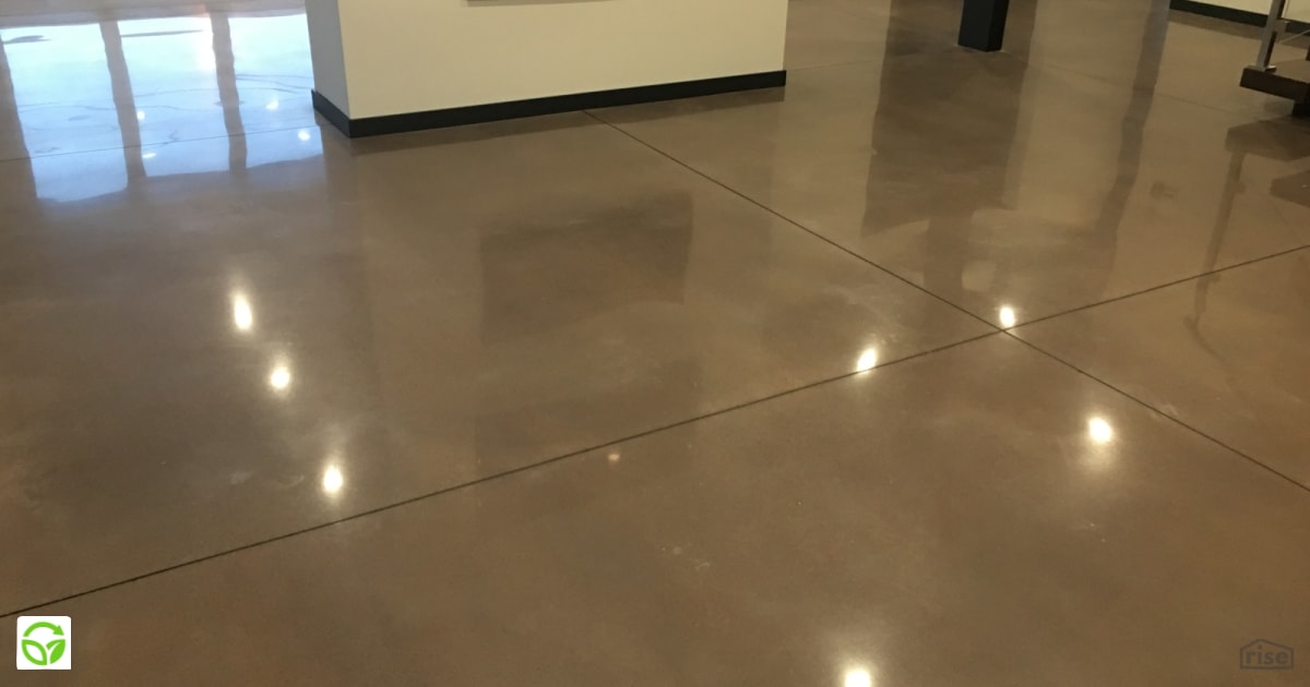 800 Grit cream polish with grey dye with Concrete Flooring by DeltaCrete