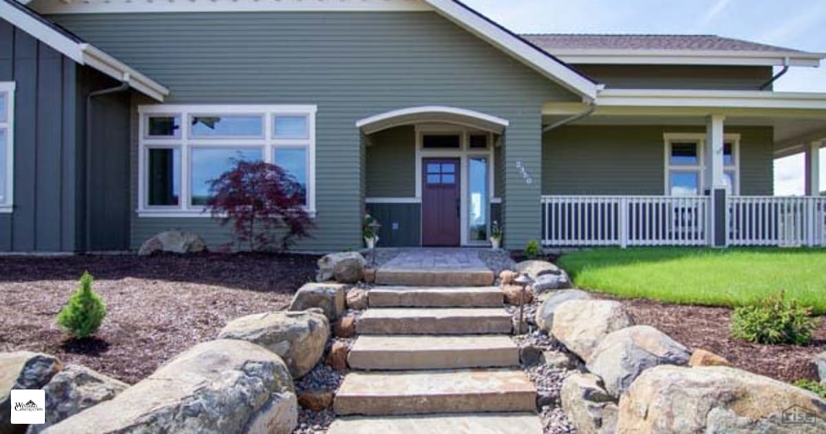 Home Exterior with Fixed Window by Winsome Construction