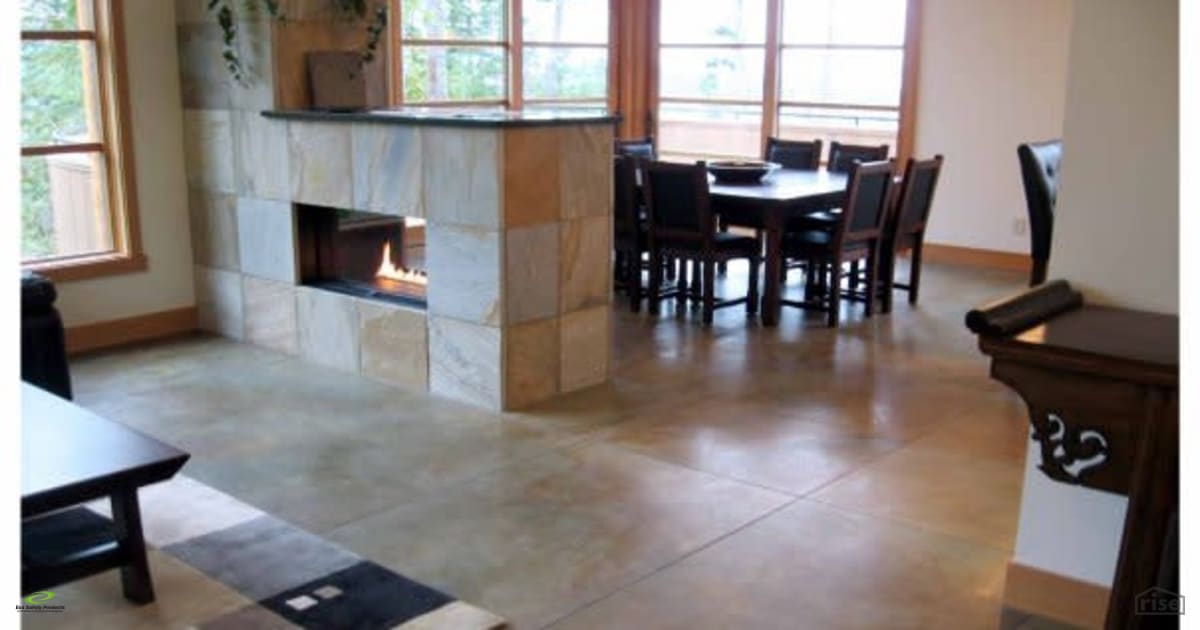 Open concept dining with SoyCrete floors around fireplace with Concrete ...