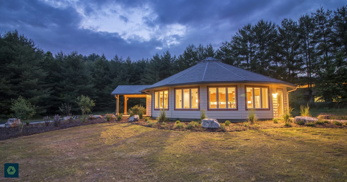 Roundhouse model home with Wood Mulch by Deltec Homes
