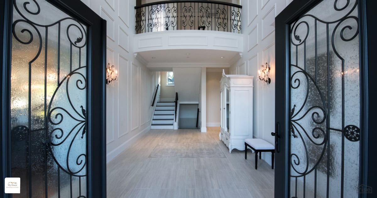 Entryway with Integrated LED by My House Design/Build Team Ltd.