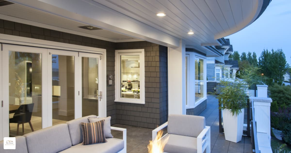 Patio with Accent Outdoor Lighting by My House Design/Build Team Ltd.