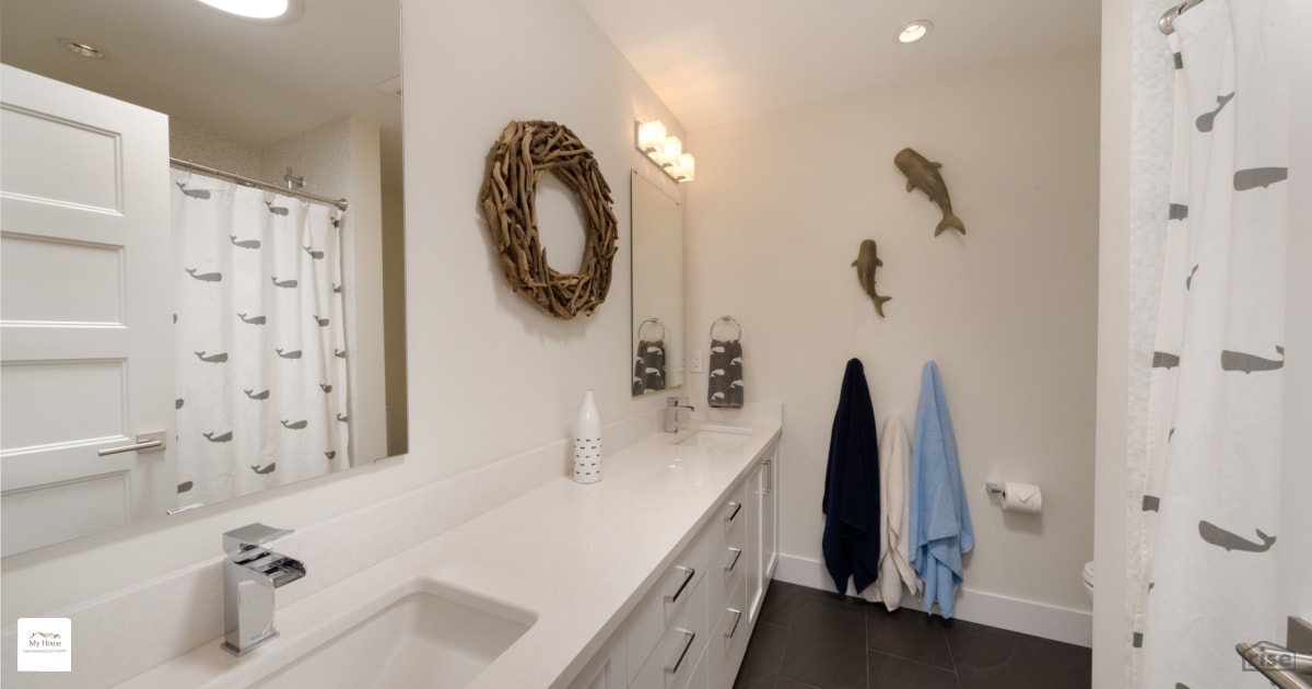 Bathroom with Low-Flow Bathroom Faucet by My House Design/Build Team Ltd.