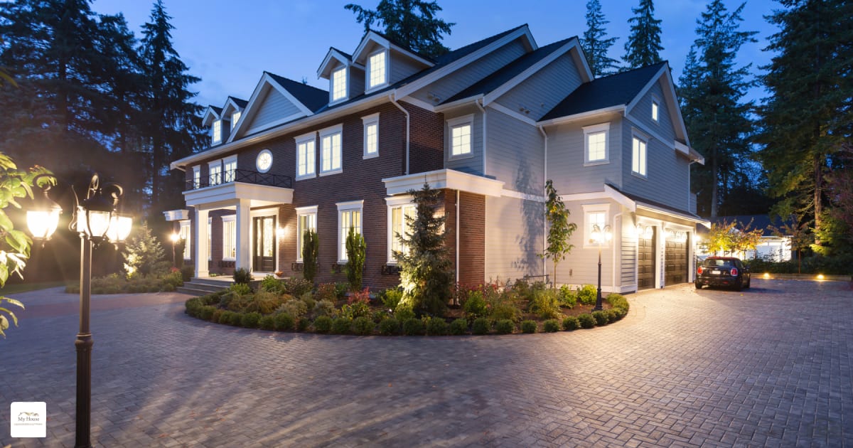 Exterior with Accent Outdoor Lighting by My House Design/Build Team Ltd.