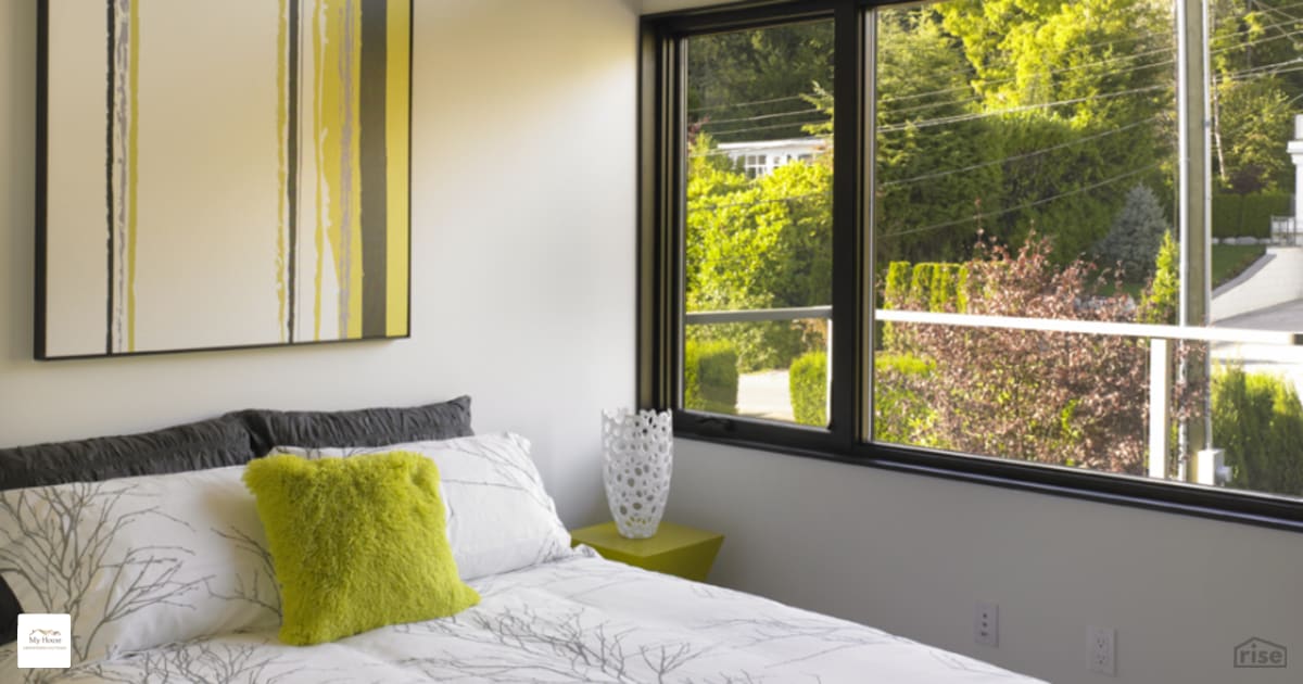 Bedroom with Fixed Window by My House Design/Build Team Ltd.