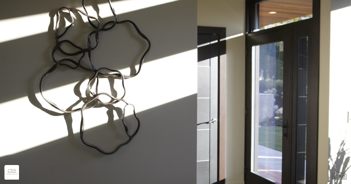 Entryway with Integrated LED by My House Design/Build Team Ltd.
