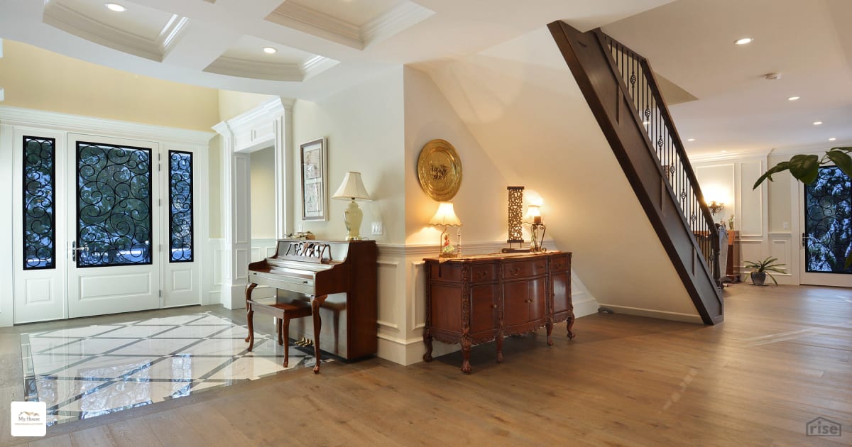 Entryway with Integrated LED by My House Design/Build Team Ltd.