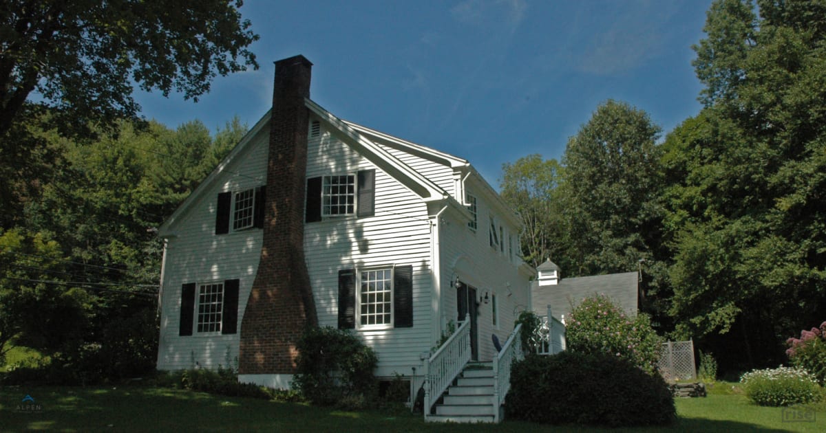 Rear exterior view of energy efficient historic home with Triple Pane ...