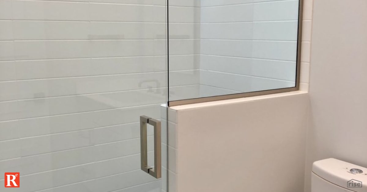 Glass shower addition with Dual Flush Toilet by Revolve Design Build