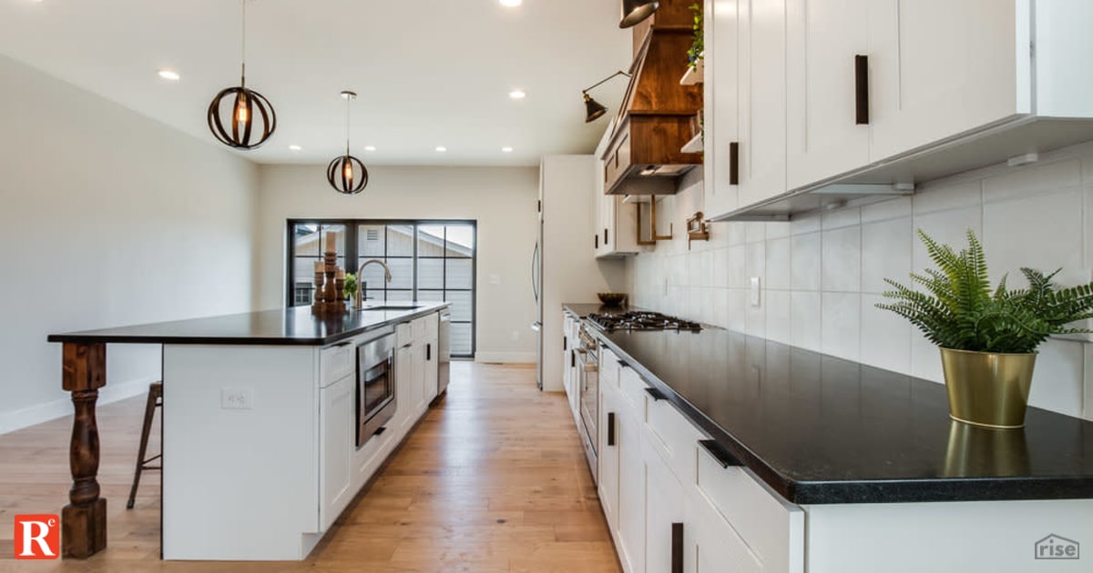 Open concept kitchen with wood features with Integrated LED by Revolve ...