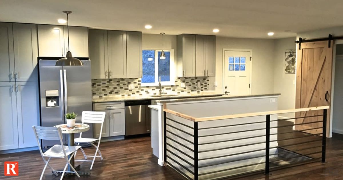 Open concept kitchen with sliding barn door with Low-Flow Kitchen ...