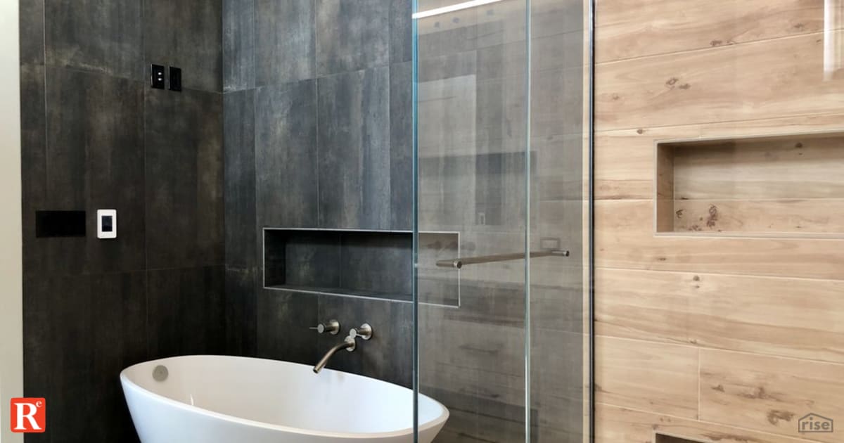 Soaker tub with large tile backdrop with Low-Flow Bathroom Faucet by ...