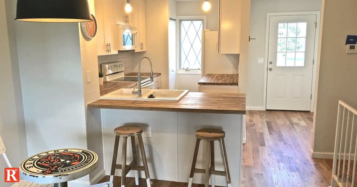 White kitchen and dining room with Energy Star Exterior Door by Revolve ...