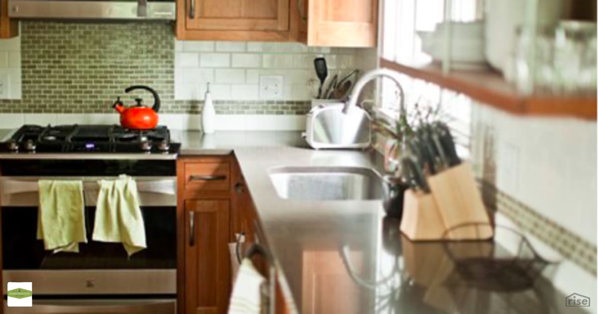 Kitchen with Gas Fireplace by Constructive Builders