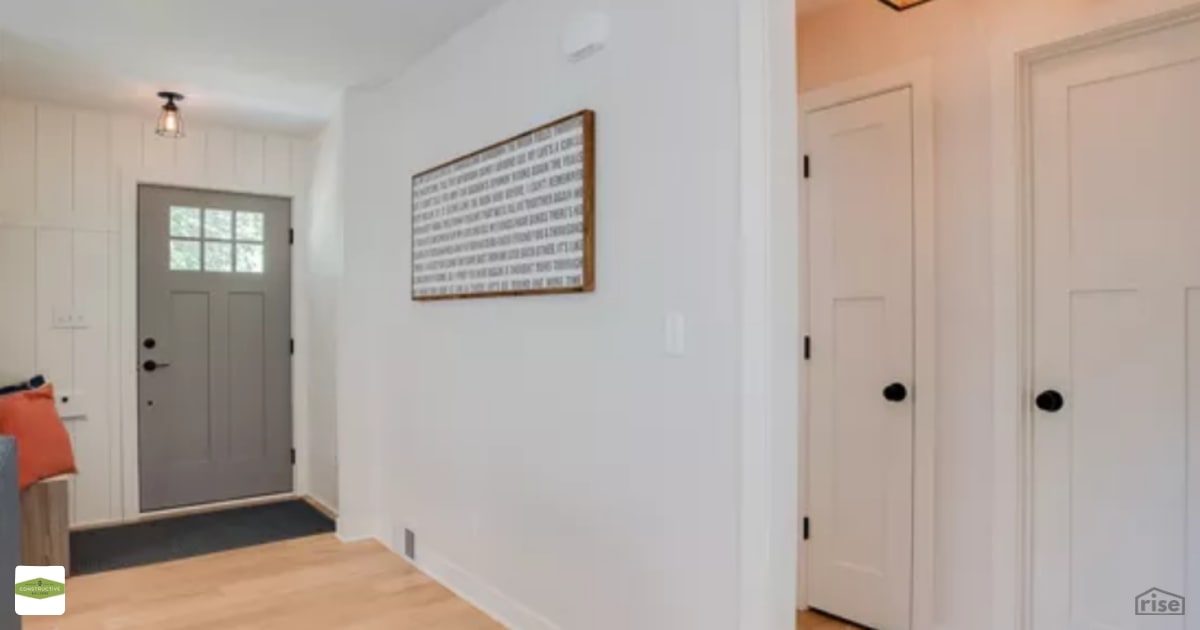 Entryway with Laminate Flooring by Constructive Builders