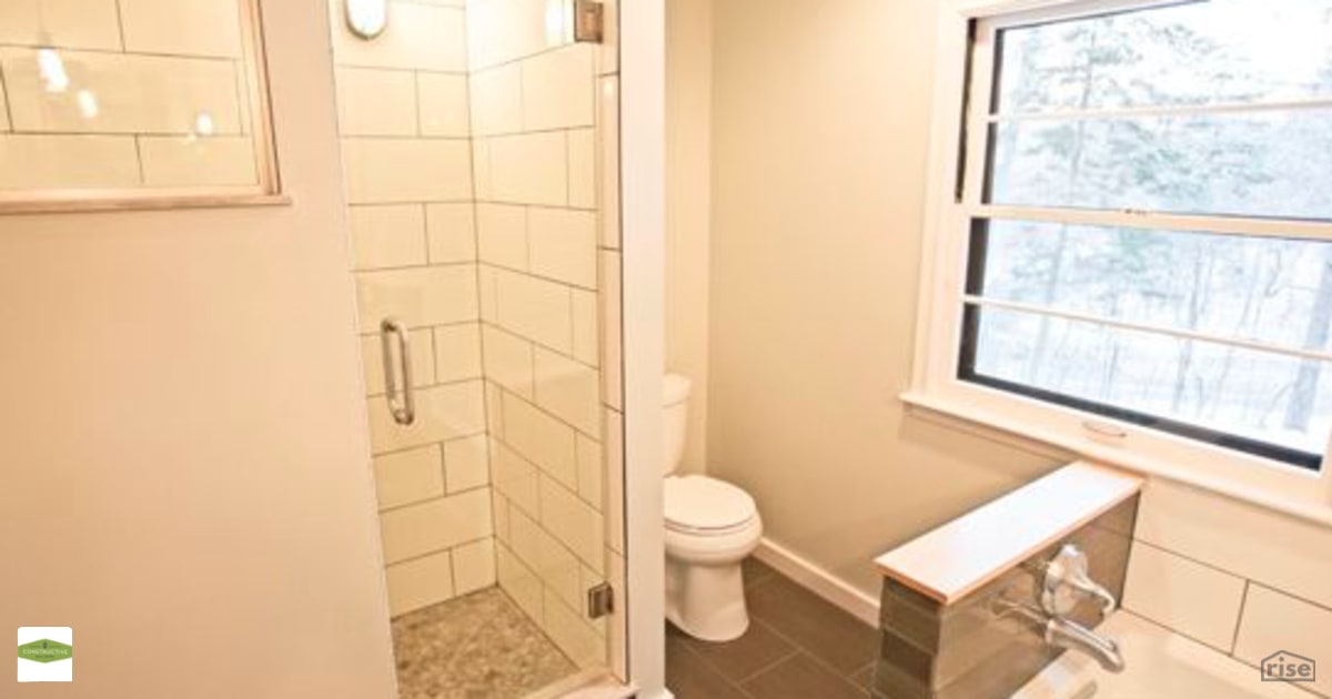 Bathroom with Dual Flush Toilet by Constructive Builders