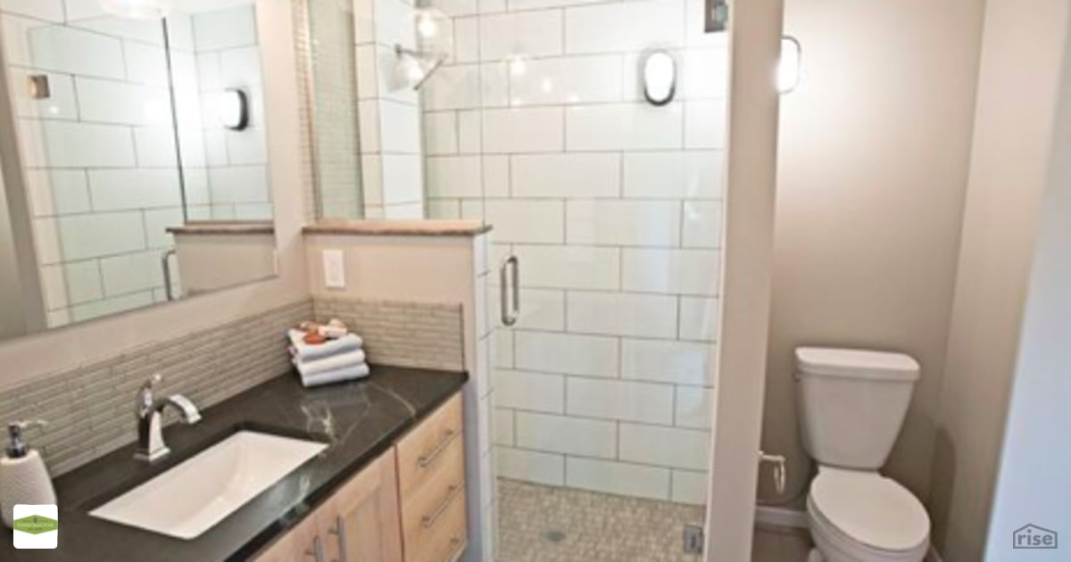 Bathroom with Dual Flush Toilet by Constructive Builders