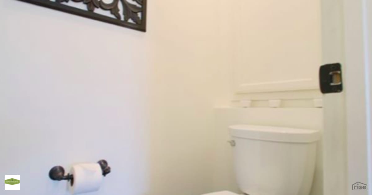 Bathroom with Dual Flush Toilet by Constructive Builders
