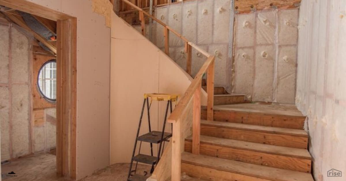 Cozy Staircase with Sheep's Wool Blown-In Insulation by Havelock Wool