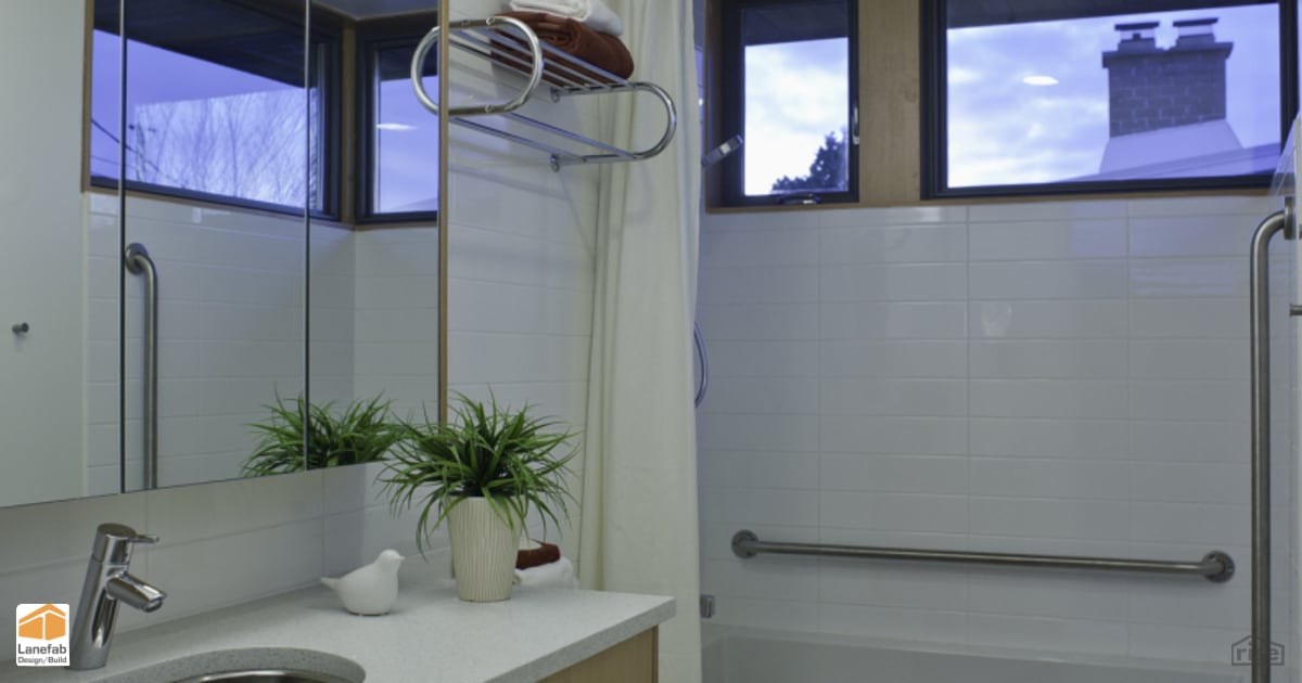 Solar Lane House Main Bath with Awning Window by Lanefab Design/Build