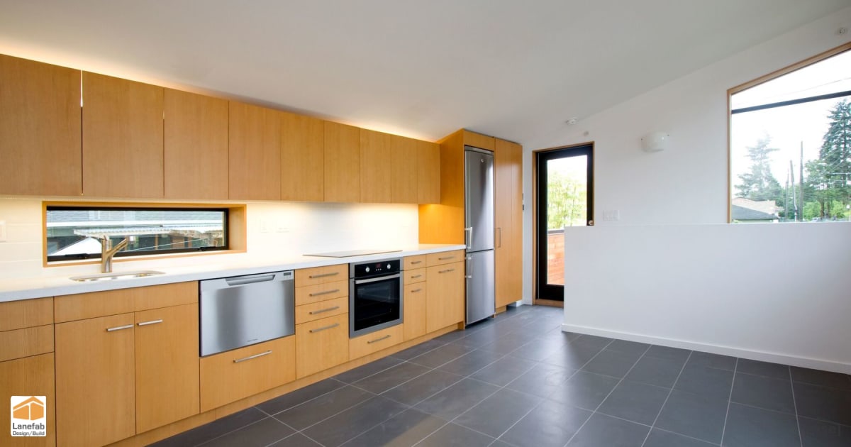 Mendoza House - Kitchen with Fixed Window by Lanefab Design/Build