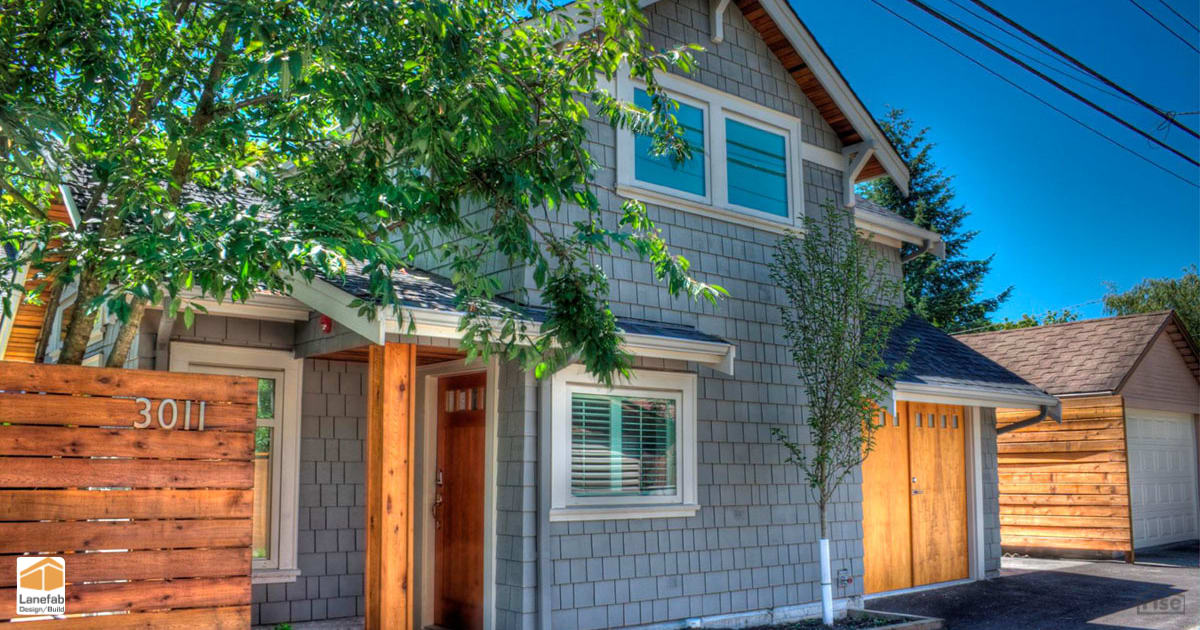 W11th Exterior Front with Clapboard Wood Siding by Lanefab Design/Build