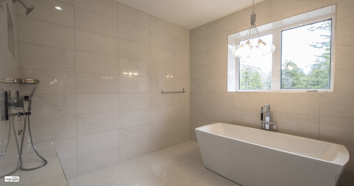 Bridge Over Water - Bathroom with Low-Flow Showerhead by Homes by Highgate