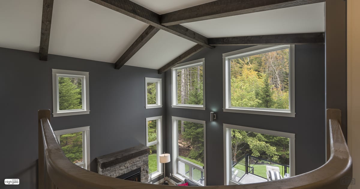 Executive Living - Staircase with Fixed Window by Homes by Highgate