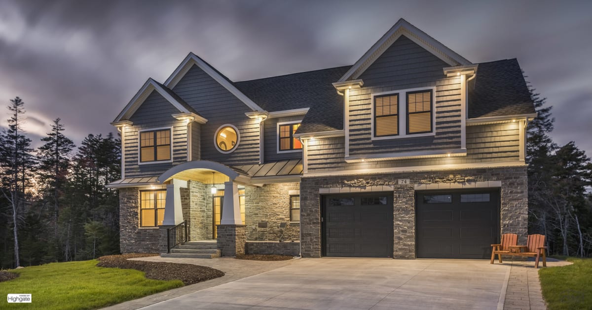 Executive Living - Exterior with Brick Siding by Homes by Highgate