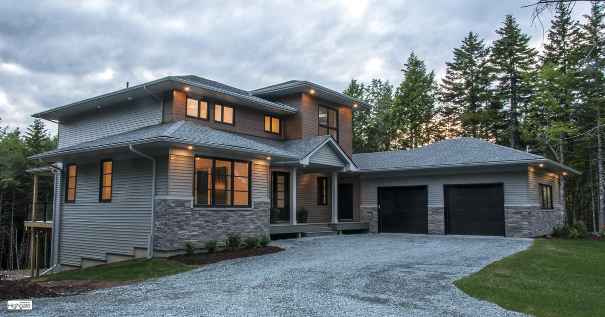 Modern Retreat - Exterior with Brick Siding by Homes by Highgate