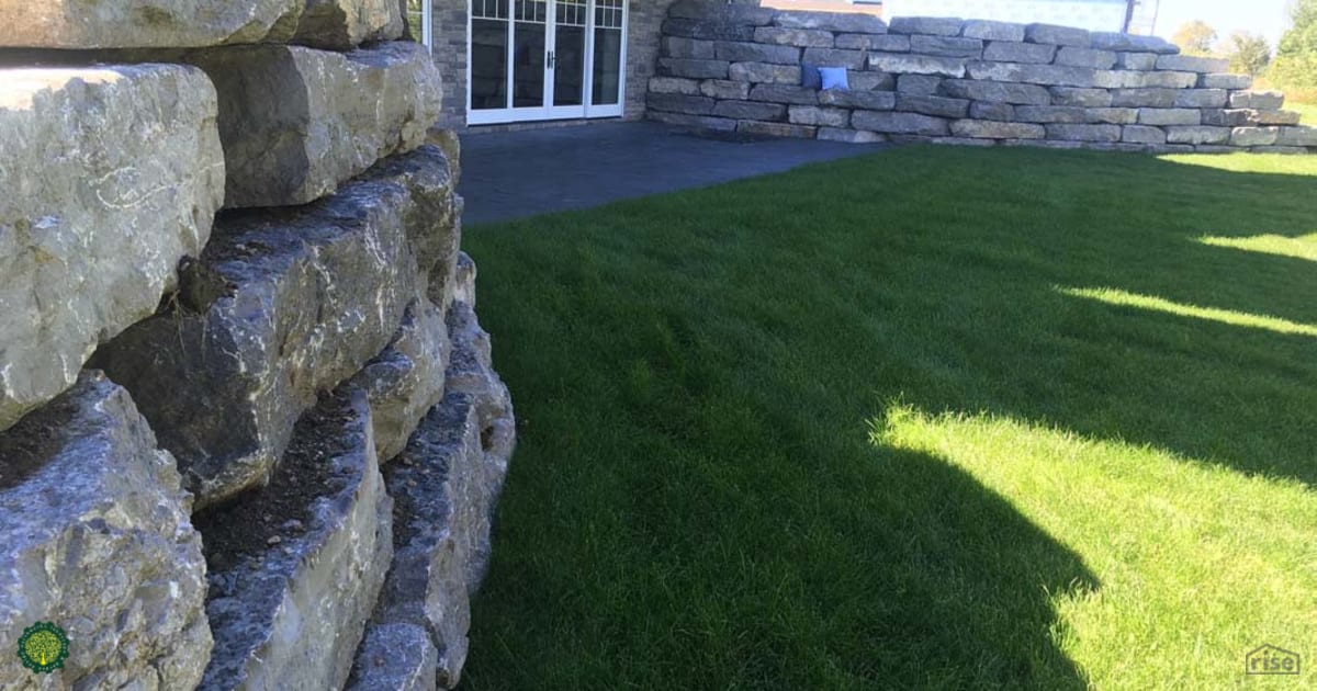 Backyard Patio with Patio Stone by Earthworks Landscape & Design