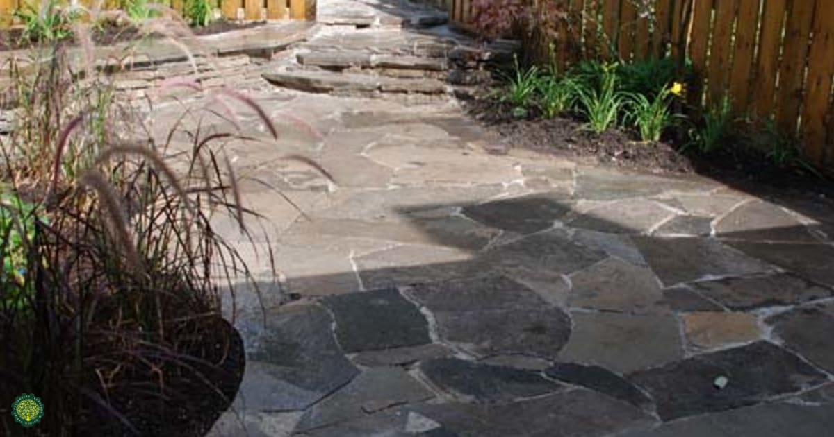 Backyard Patio with Patio Stone by Earthworks Landscape & Design