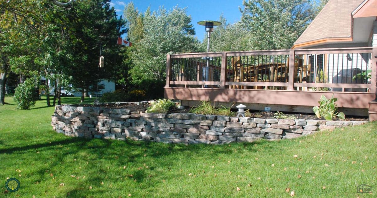 Rear Deck with Natural Stones with Pressure Treated Decking by ...
