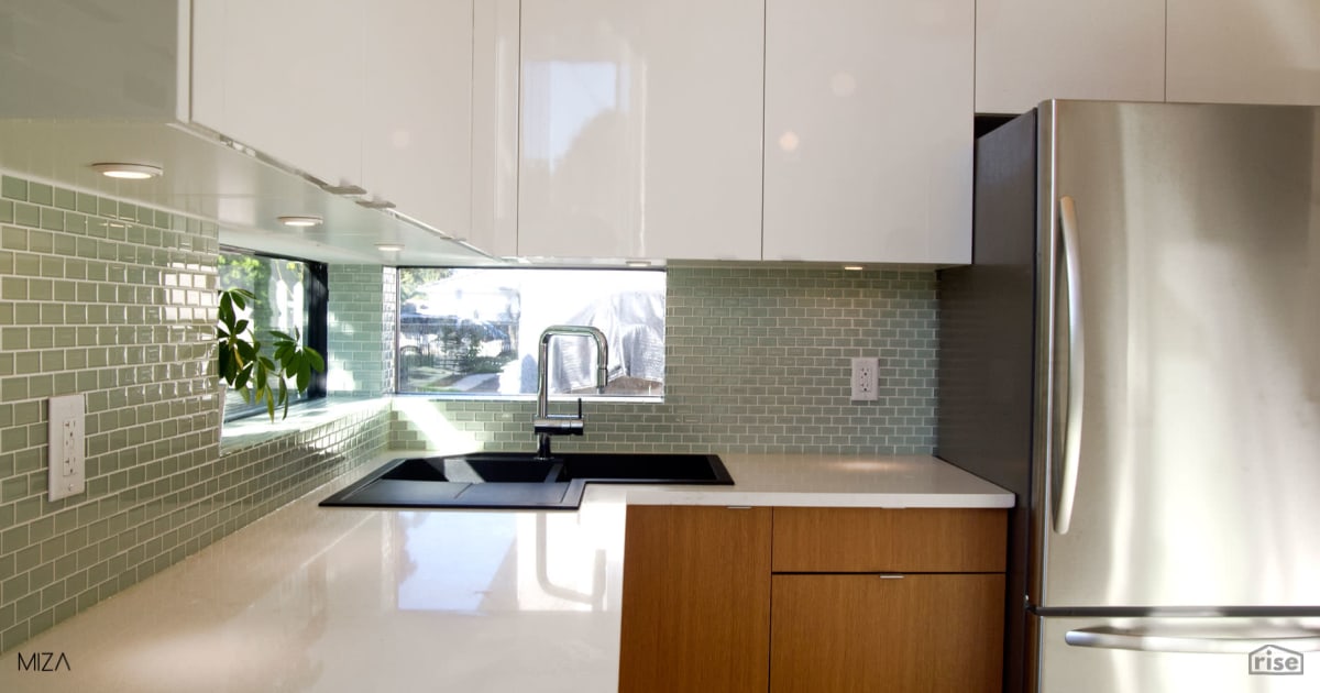 Kitchen with Aluminum or Metal Window Frame by MIZA Architects
