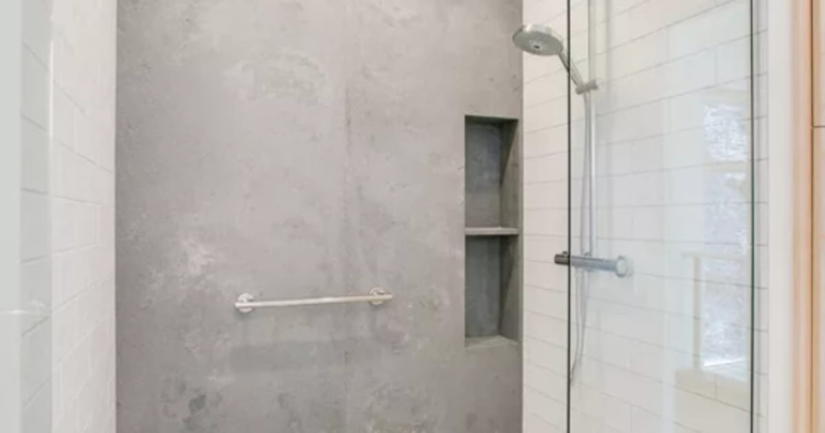 Shower with Low-Flow Showerhead by Constructive Builders