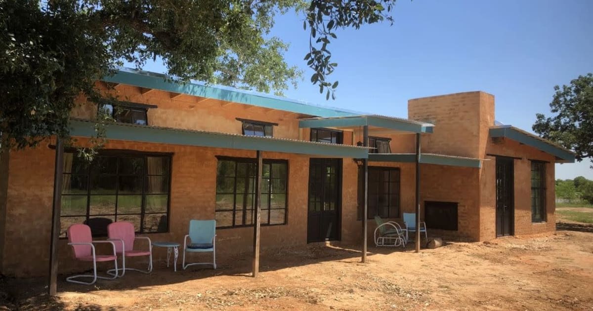 Rise | Compressed earth block home exterior with Compressed Earth ...