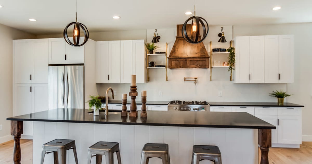 Bright white open concept kitchen with Low-Flow Kitchen Faucet by ...