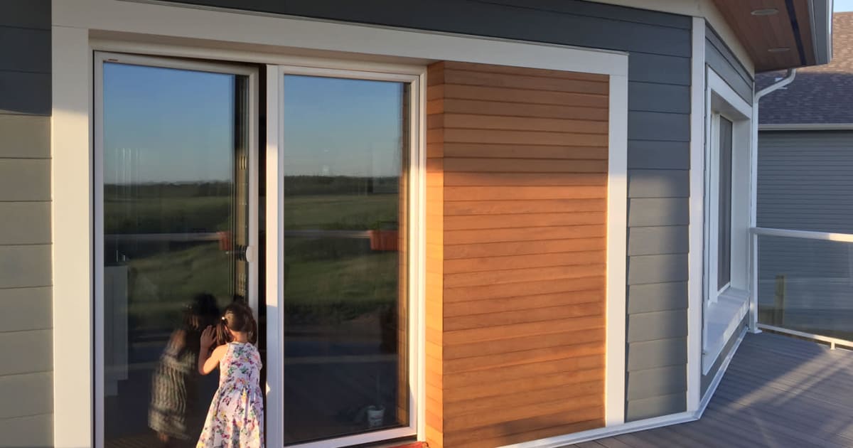 Rise | Exterior Deck with Fiber Cement Siding by MIZA Architects