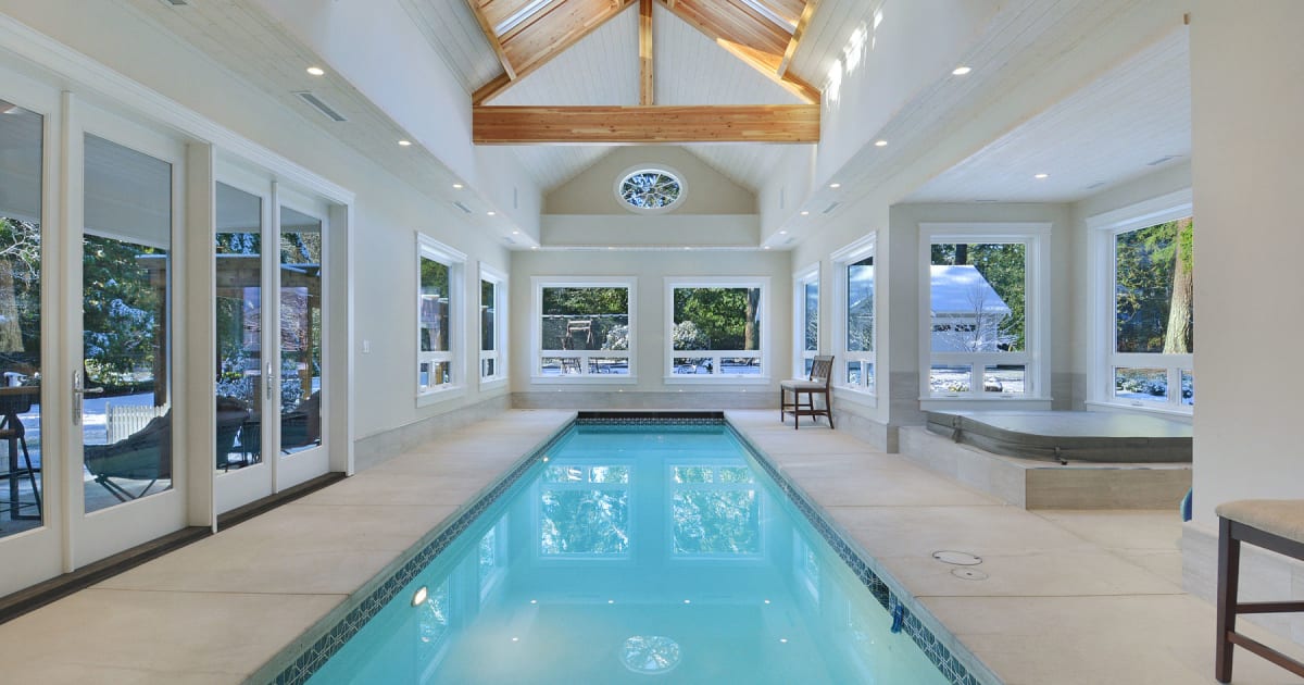 Rise | Indoor Pool with Integrated LED by My House Design/Build Team Ltd.