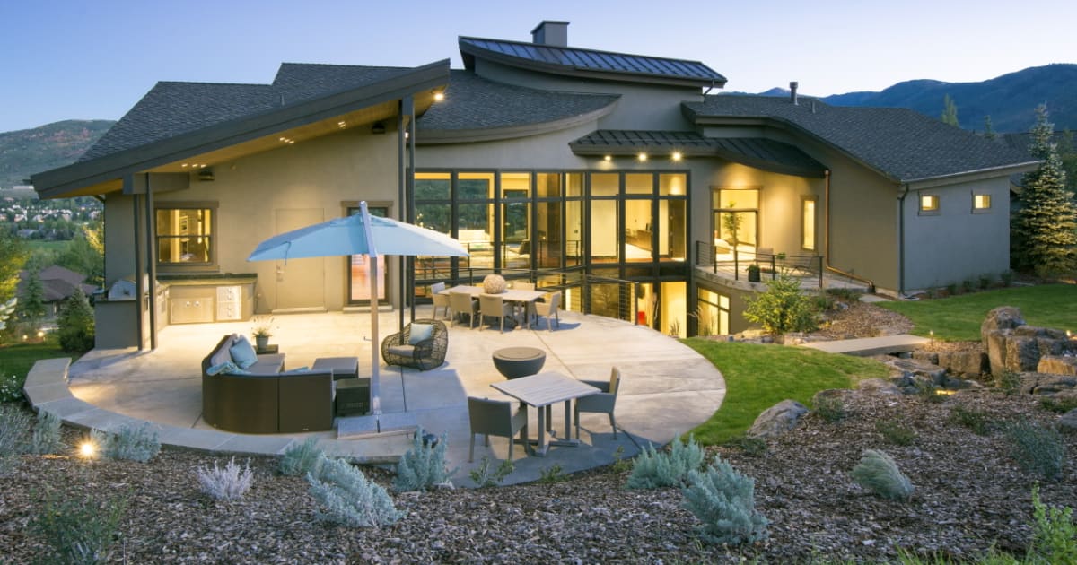 Rise | Rear patio of Utah dream home with Integrated LED by Alpen High ...
