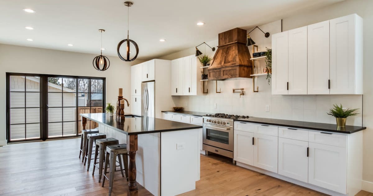 Rise | Open concept kitchen with wood feature range hood with FSC ...