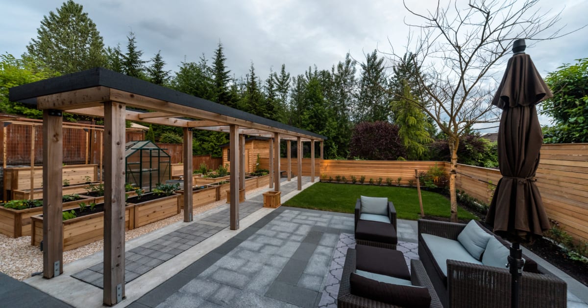 Rise | Patio with Outdoor Gardens by My House Design/Build Team Ltd.