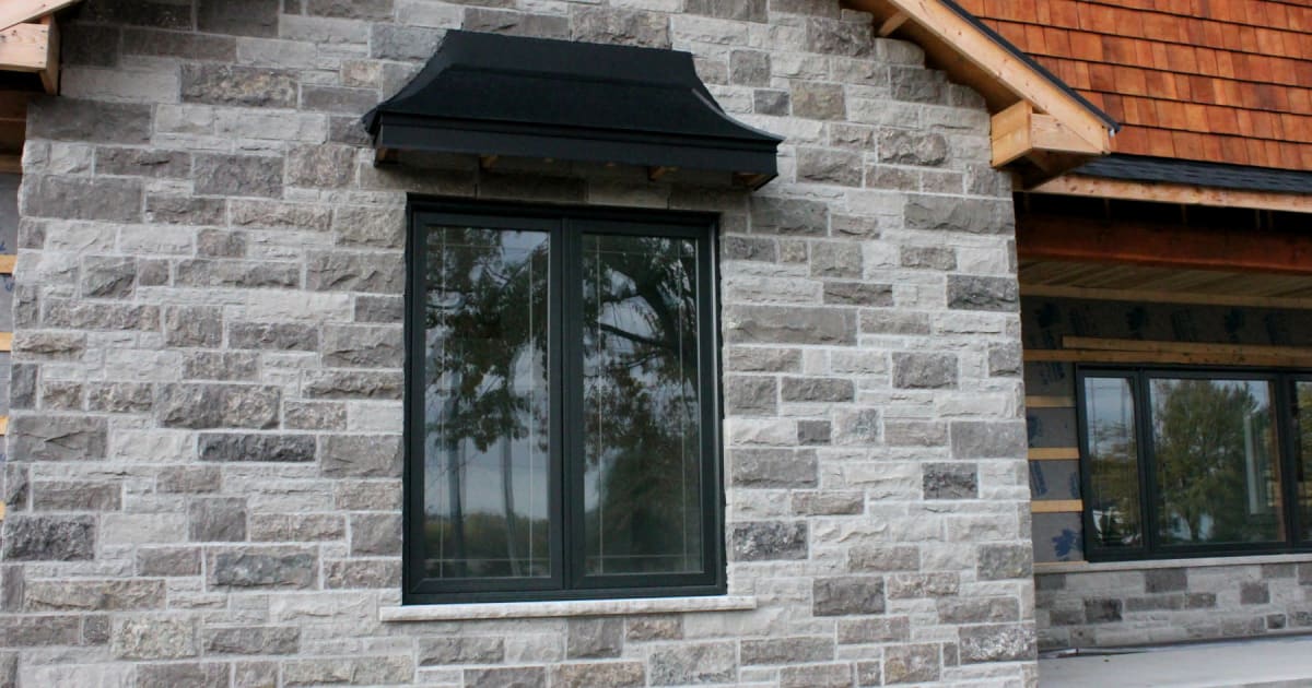 Rise | House with stone siding complimented by wood shingles with Stone ...