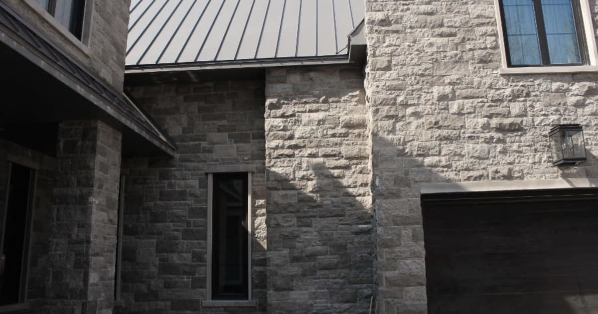 House with Stone Siding with Stone Siding by Masonal Stone Inc
