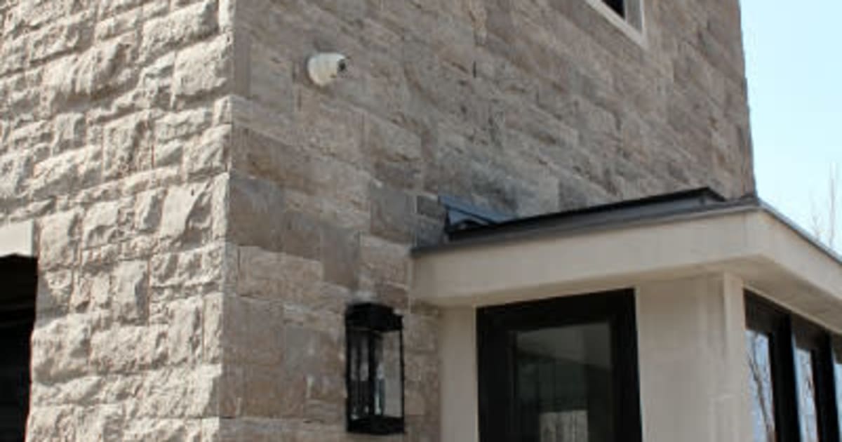 Stone House With Security Camera with Stone Siding by Masonal Stone Inc