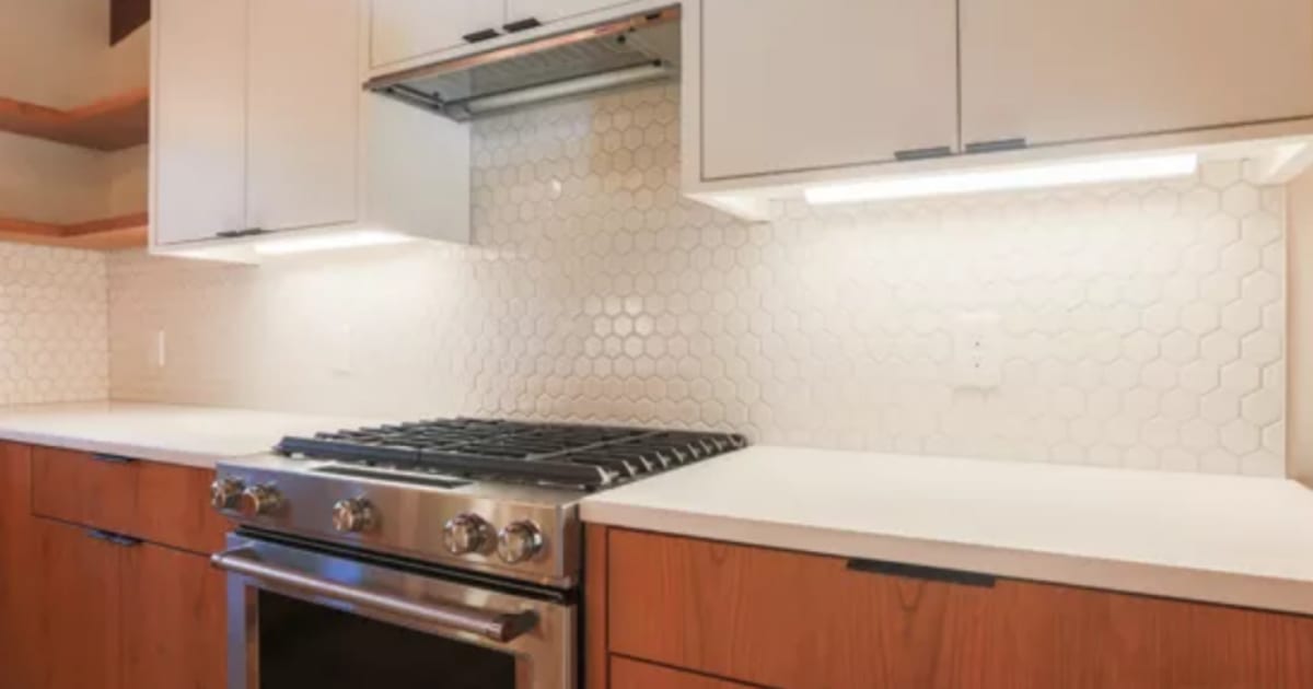 Rise | Kitchen with Gas Range by Constructive Builders