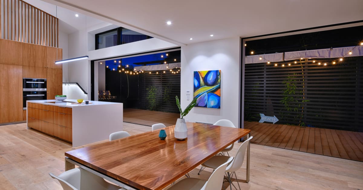 Rise | Dining Room with Wall Oven by Alliance Green Builders