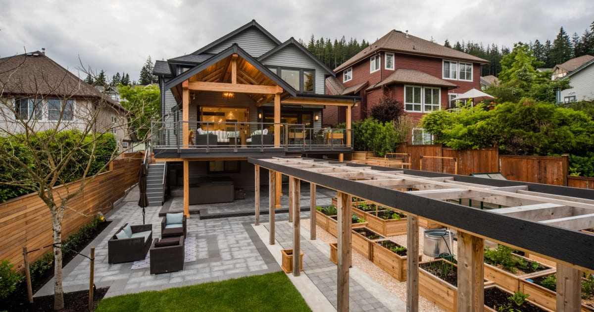 Rise | Exterior with Outdoor Gardens by My House Design/Build Team Ltd.